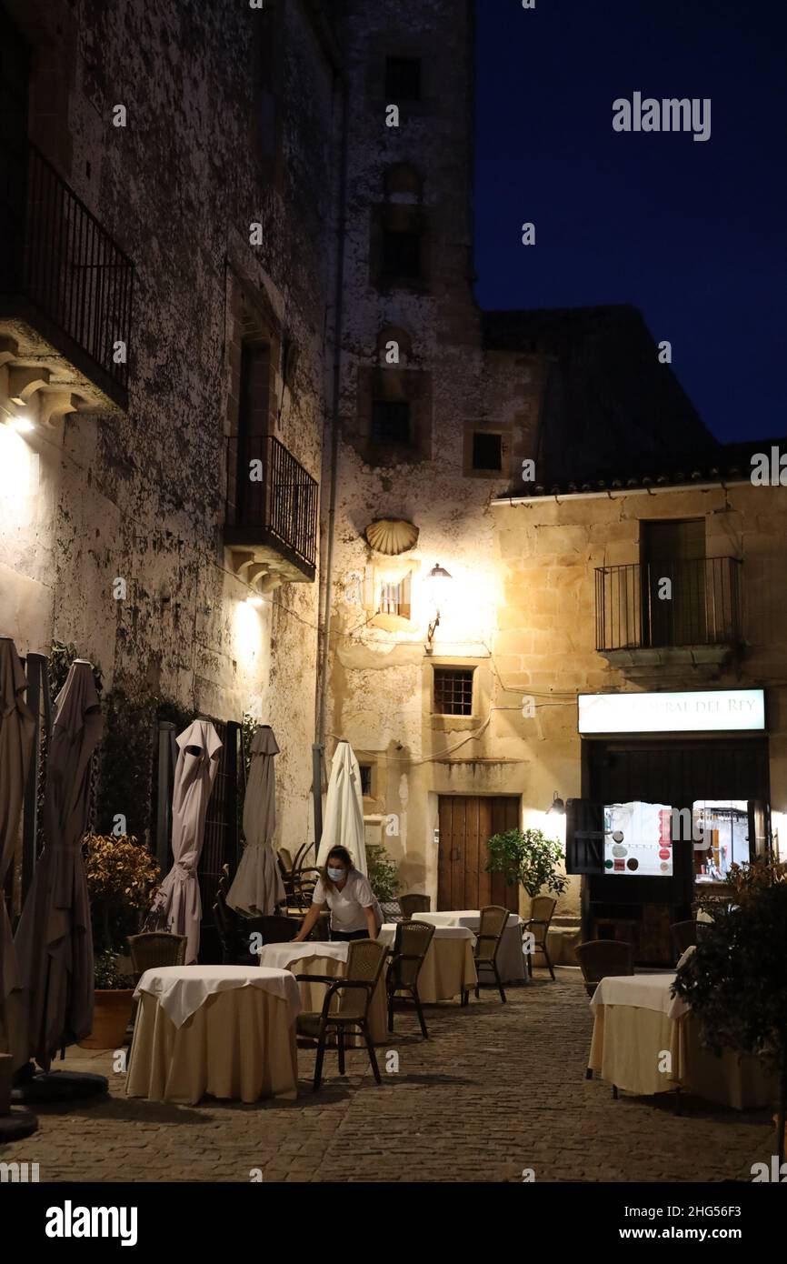 Trujillo.Street scene off the Plaza Major at night. Restaurant Corral ...