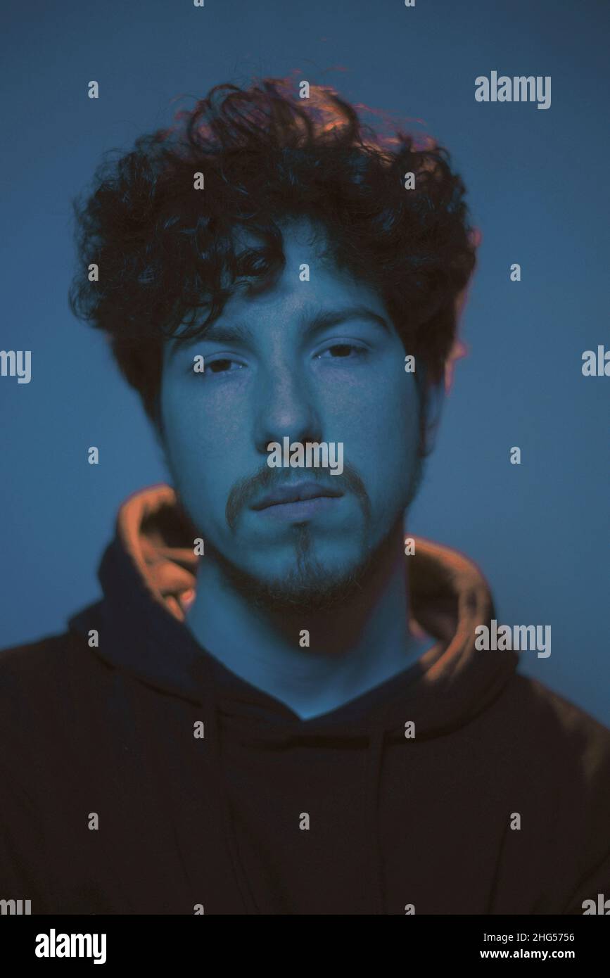 Studio portrait with blue lights Stock Photo - Alamy