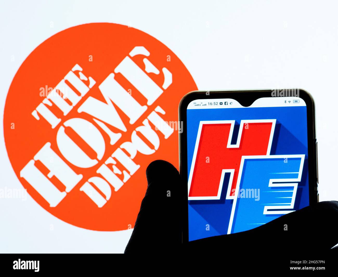 In this photo illustration, the Hardware Express logo is seen displayed ...