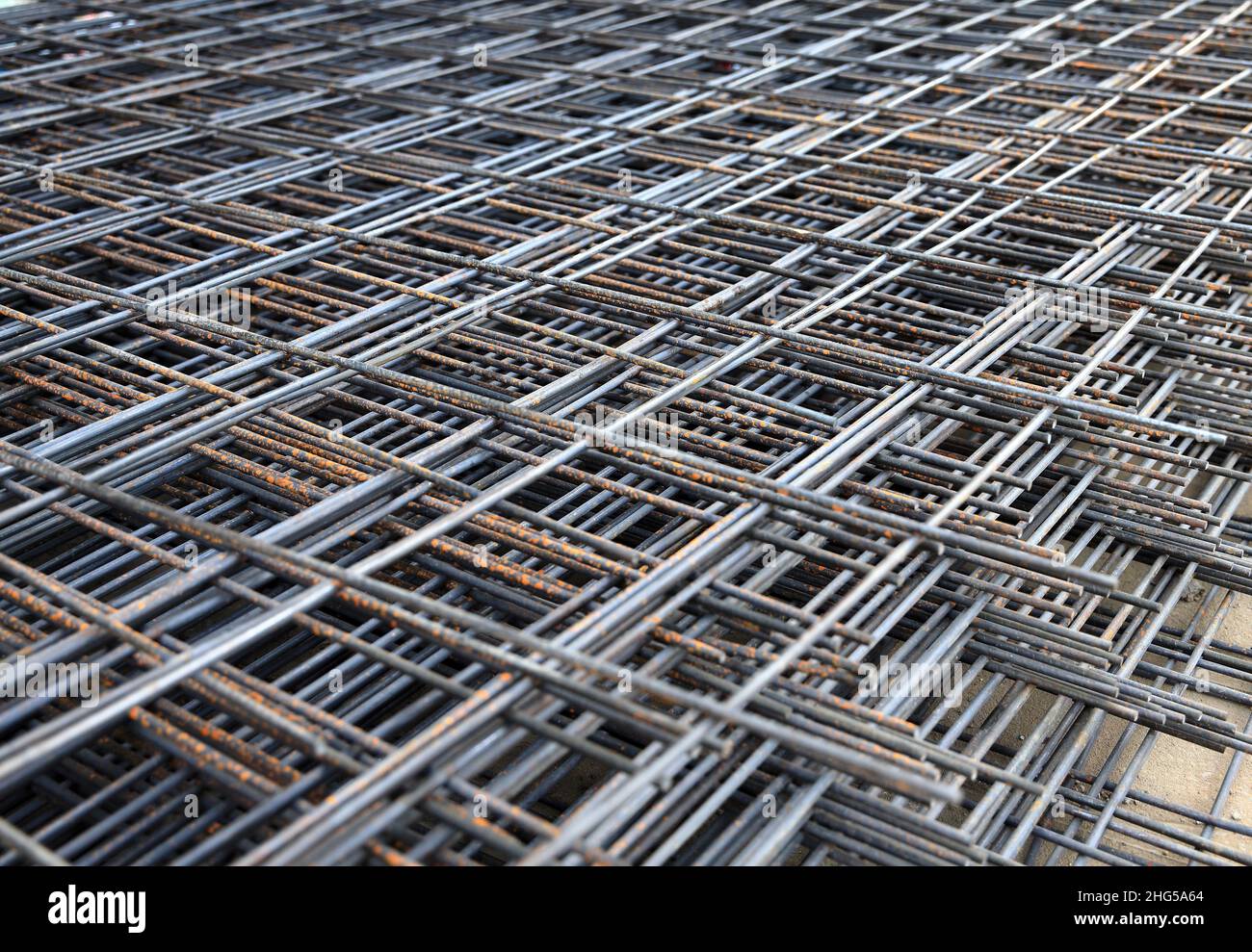 steel rod or rebar with some rust bonded with steel wire for use as a ...