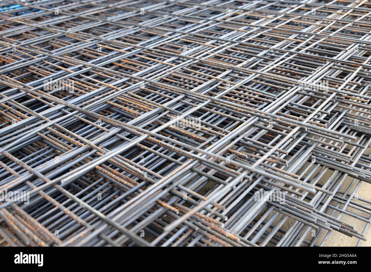 steel rod or rebar with some rust bonded with steel wire for use as a ...