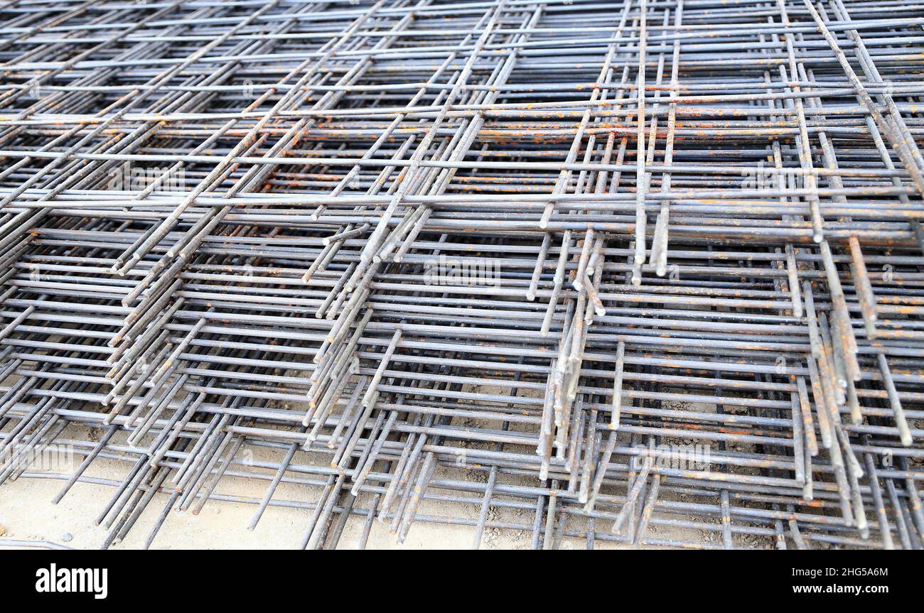 steel rod or rebar with some rust bonded with steel wire for use as a ...