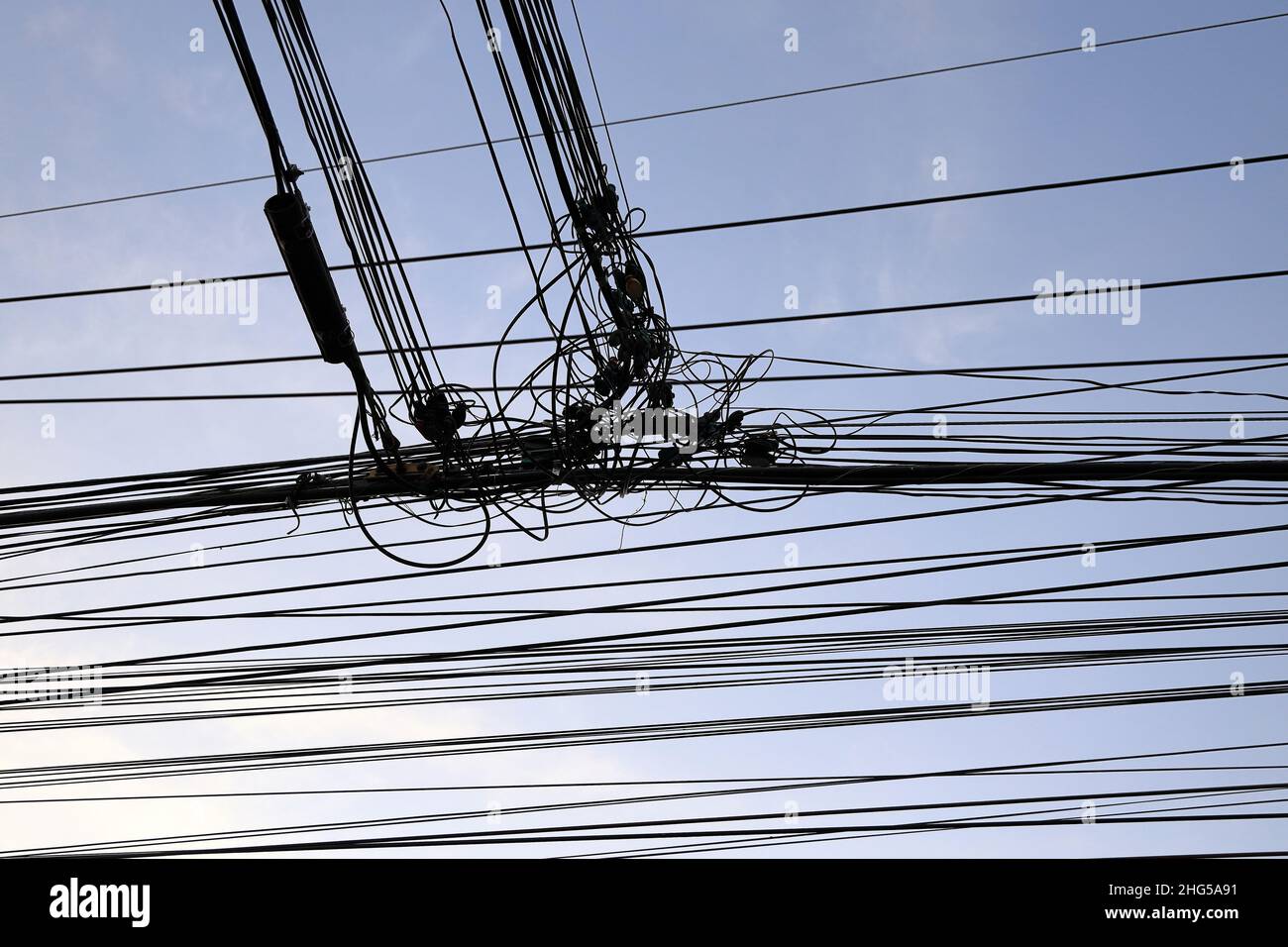 bunch of electrics and communication wires, wires on the pole, The ...