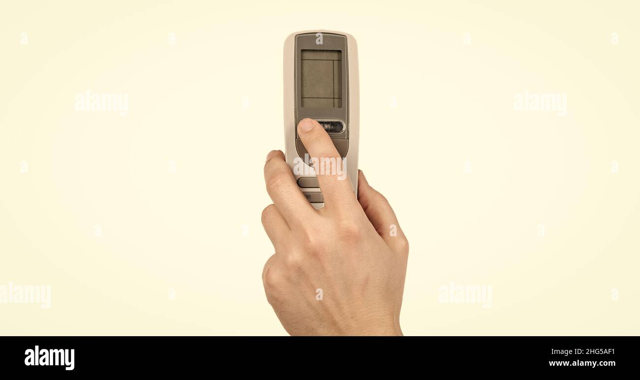 hand pressing button on remote control isolated on white, controlling ...
