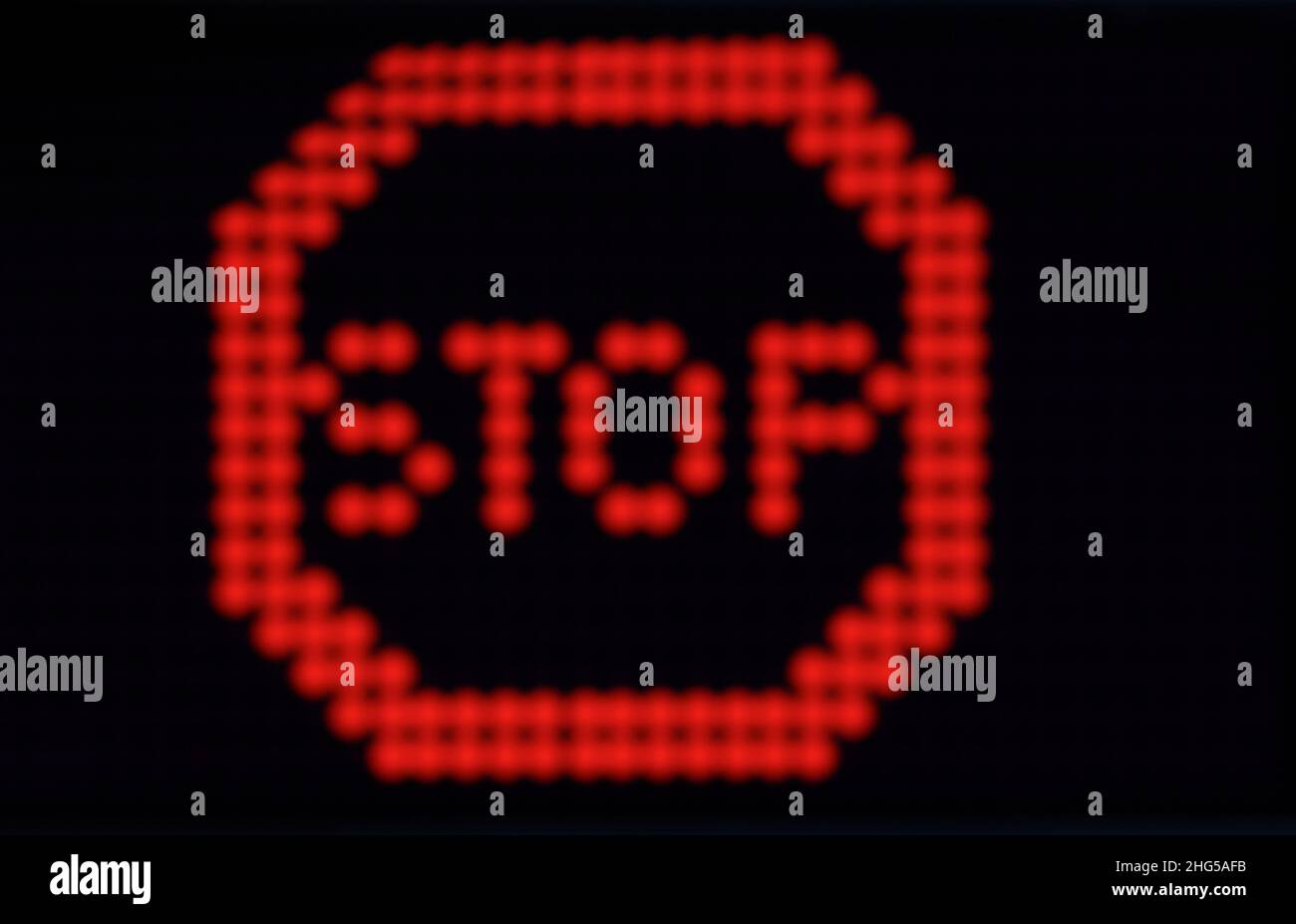 Blur of Red LED digital font or characters on black background, Digital ...