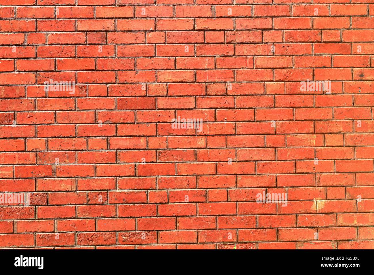 red shiny brick wall, wide panorama of masonry, bricklaying Stock Photo ...