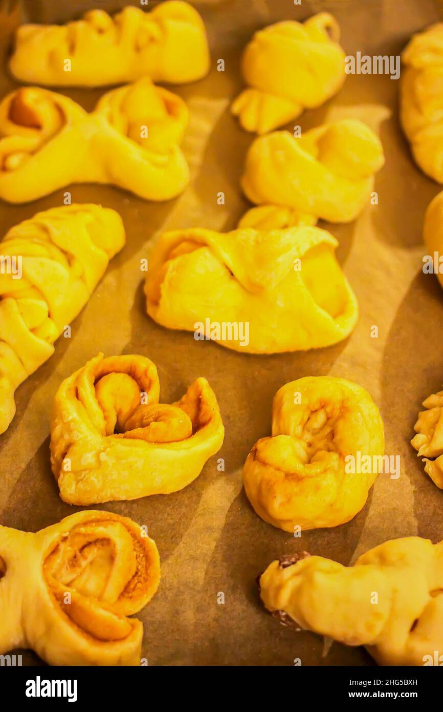 Raw unbaked buns. Cooking process. Traditional pastry Stock Photo - Alamy