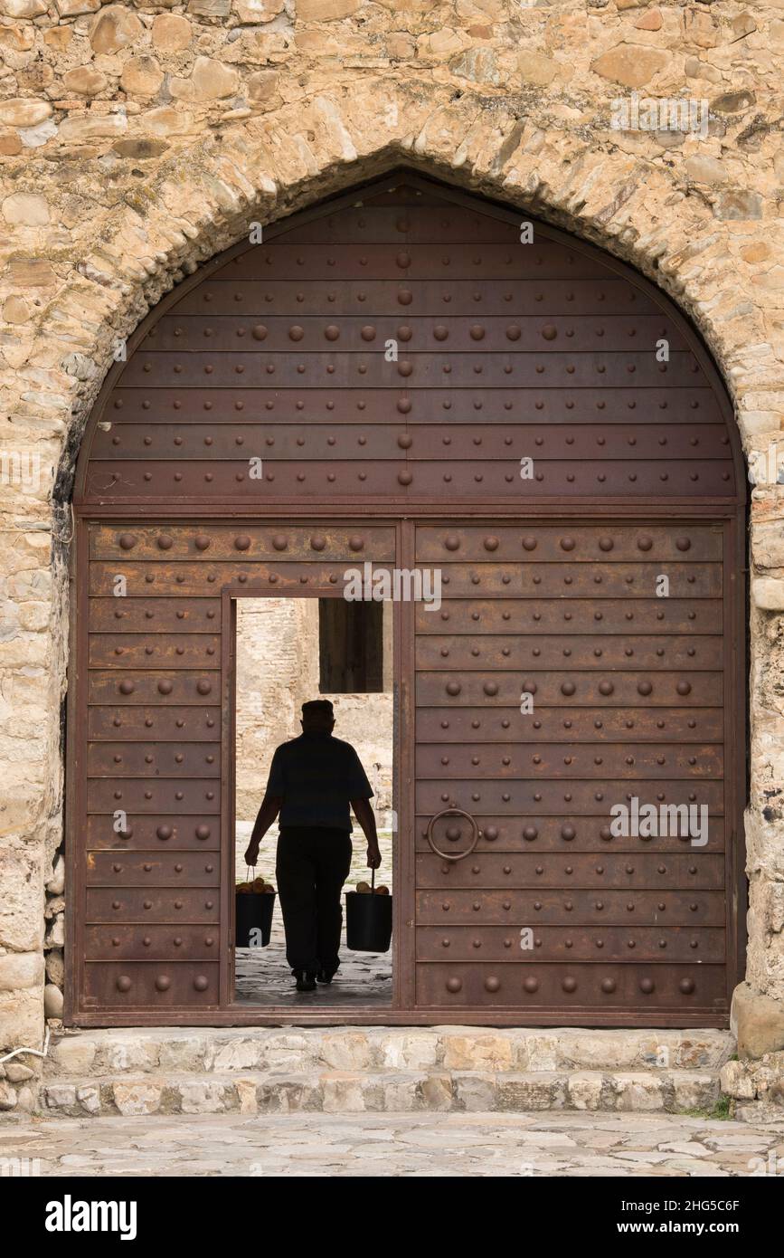 Man walking through gate hi-res stock photography and images - Alamy