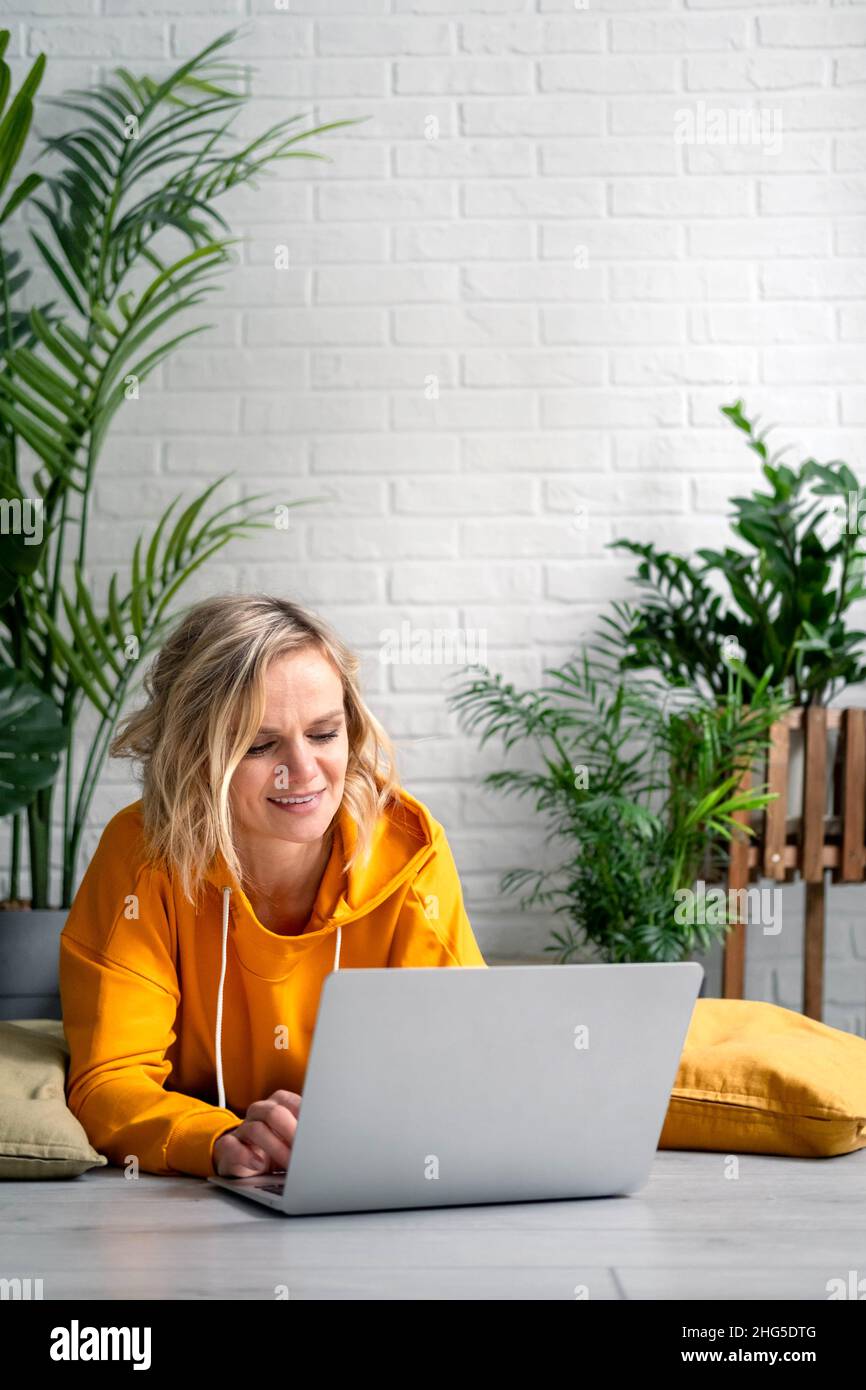 Woman girl using computer laptop working office work remotely from home ...