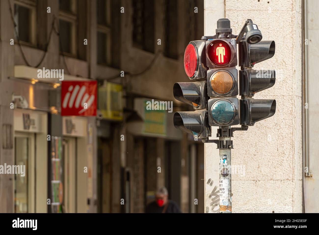 Pisa, Italy - August 10, 2021: pedestrian traffic light with a ...