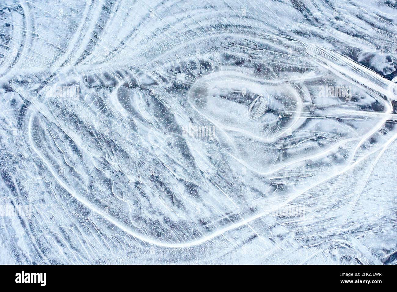 Close up of the intricate circular pattern formed in the ice of a ...