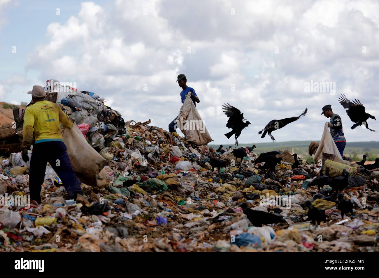 People seen collecting garbage hi-res stock photography and images - Alamy