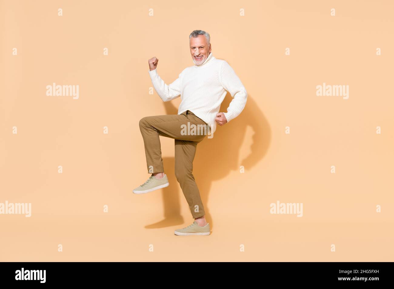 Full length body size view of attractive cheerful grey-haired man ...