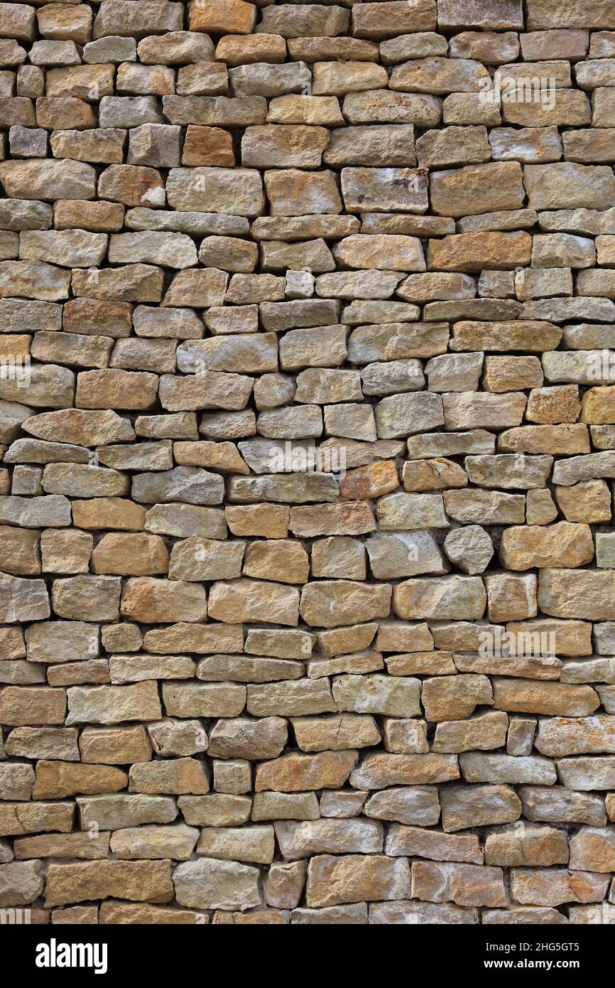 Natural stone wall made of sandstones Stock Photo - Alamy