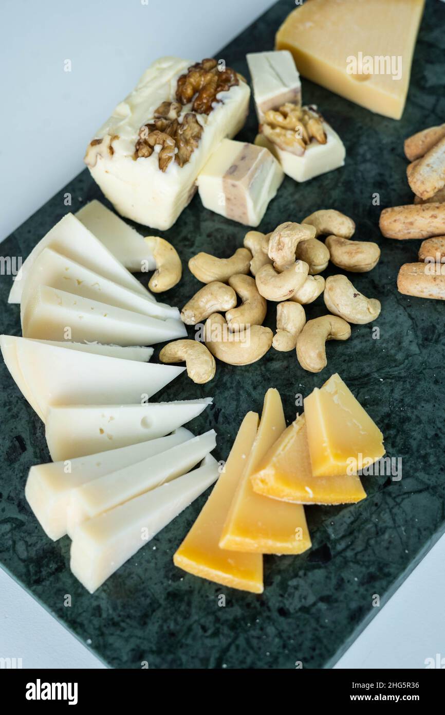 A table with varieties of ripened and soft cheeses Stock Photo - Alamy