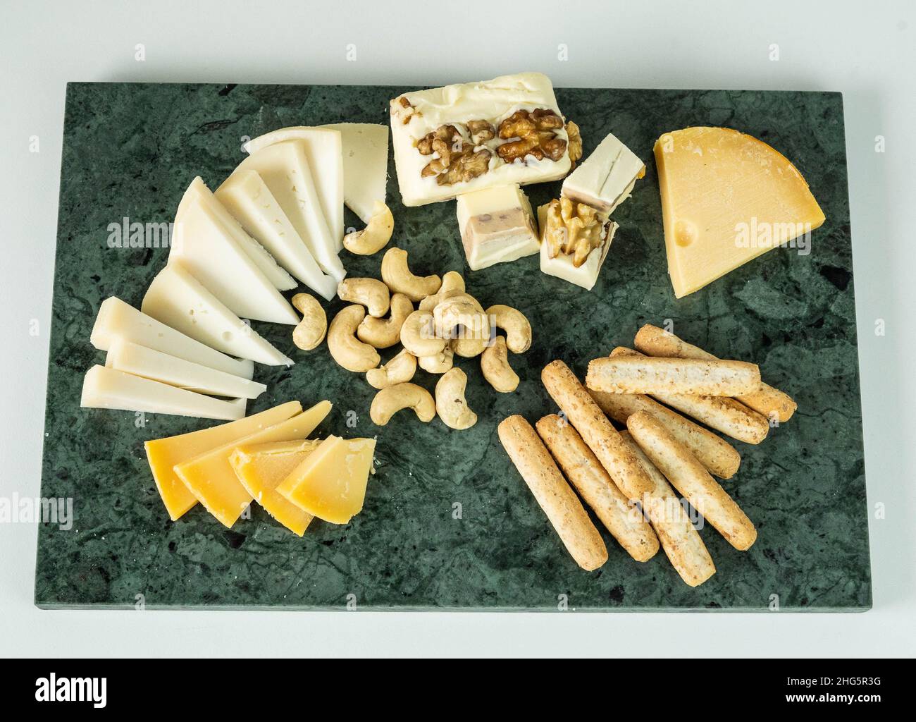 A table with varieties of ripened and soft cheeses Stock Photo - Alamy