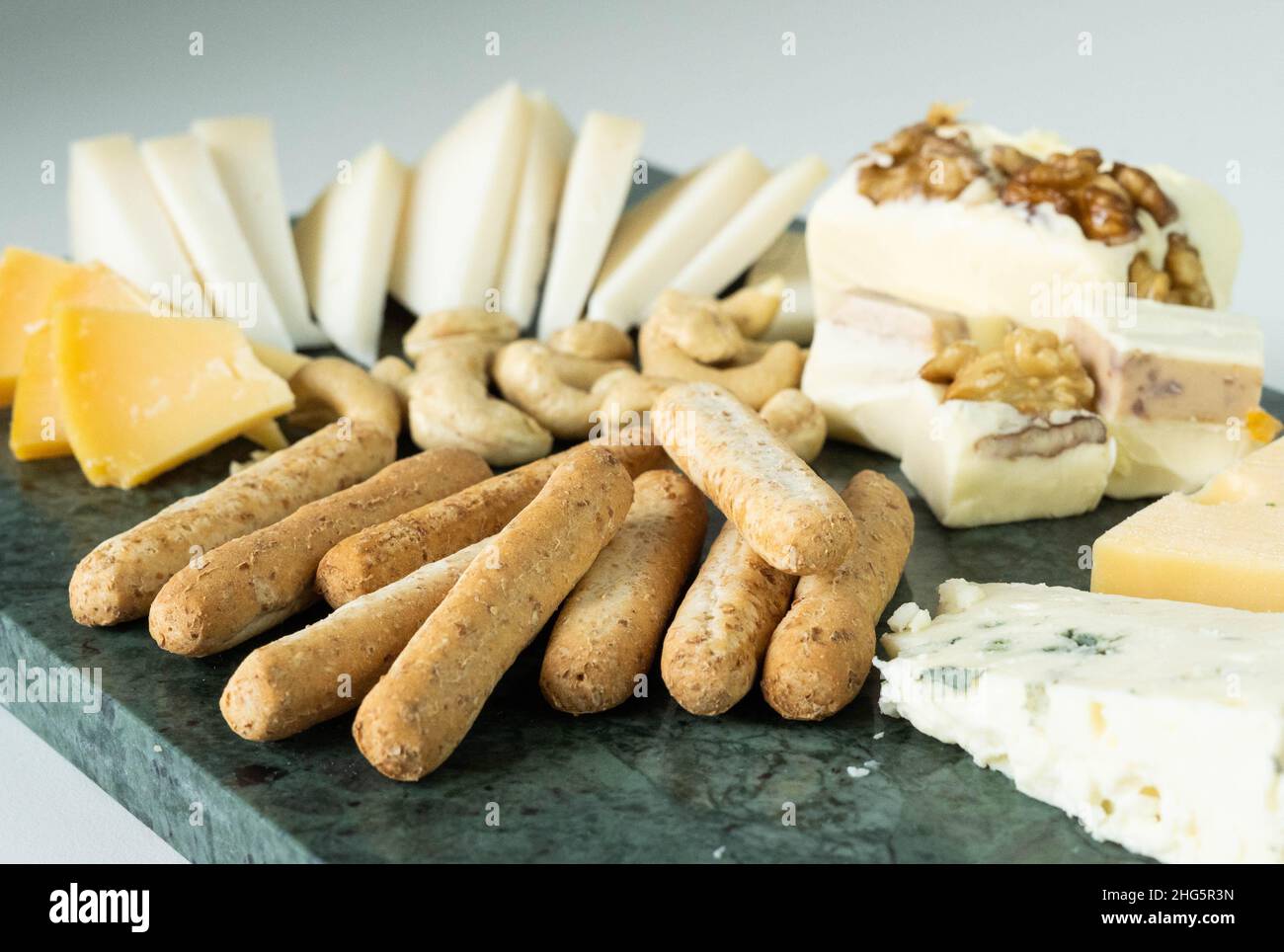A table with varieties of ripened and soft cheeses Stock Photo - Alamy