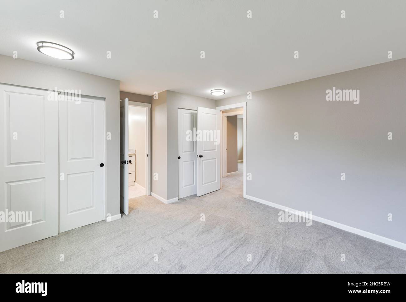 Modern residential empty bedroom interior Stock Photo - Alamy