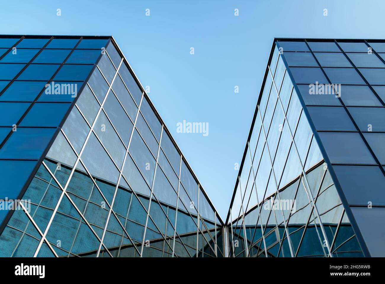 Modern office building with blue windows Stock Photo - Alamy