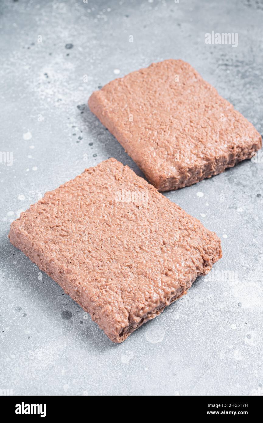 Raw plant based meat, food reduce carbon footprint. Gray background ...