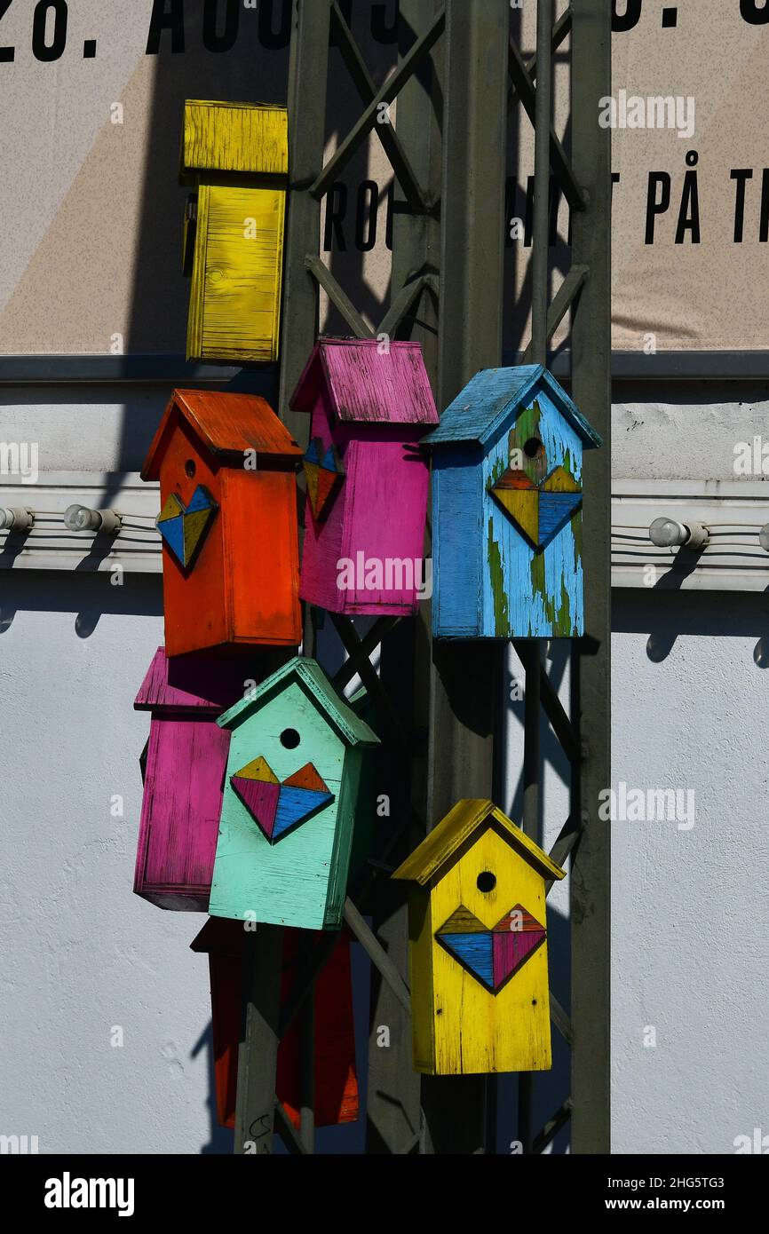 Decorative bird boxes on a pylon outside the Tivoli gardens, Copenhagen ...