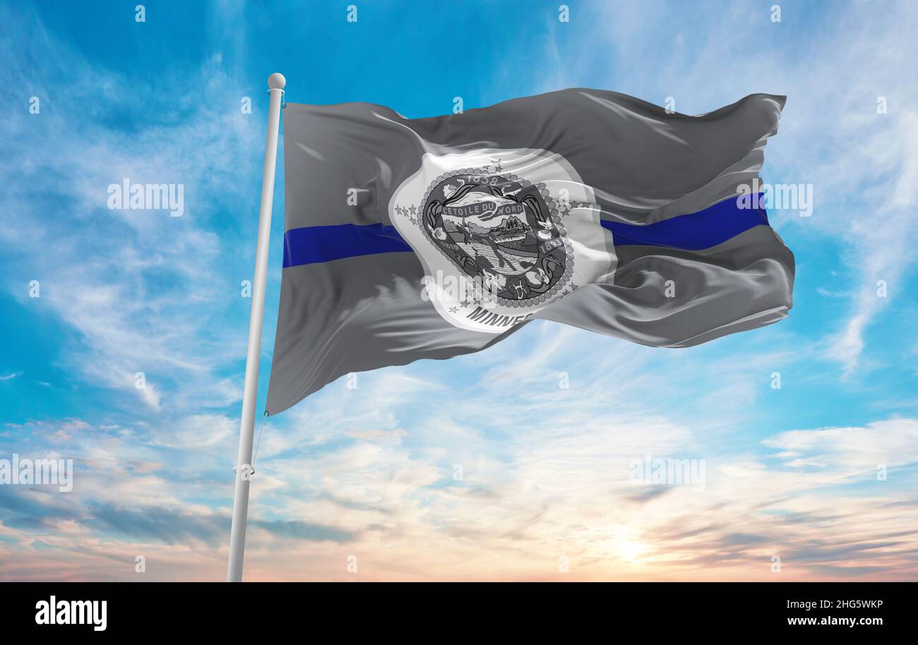 blue line flag of Minnesota state, Usa at cloudy sky background on ...