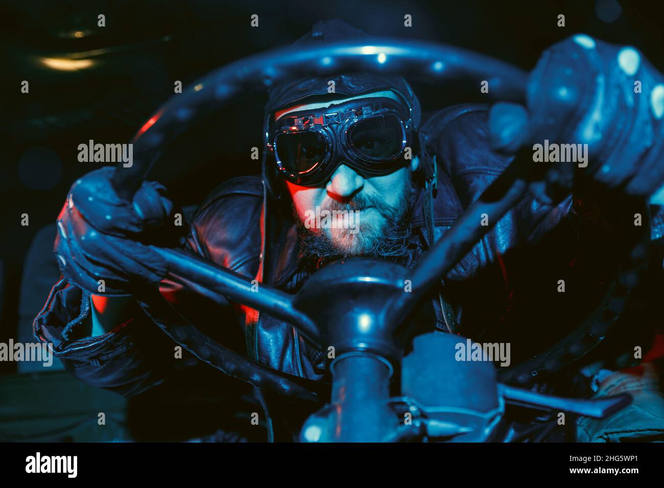 Old school retro image of crazy driver with beard wearing vintage ...