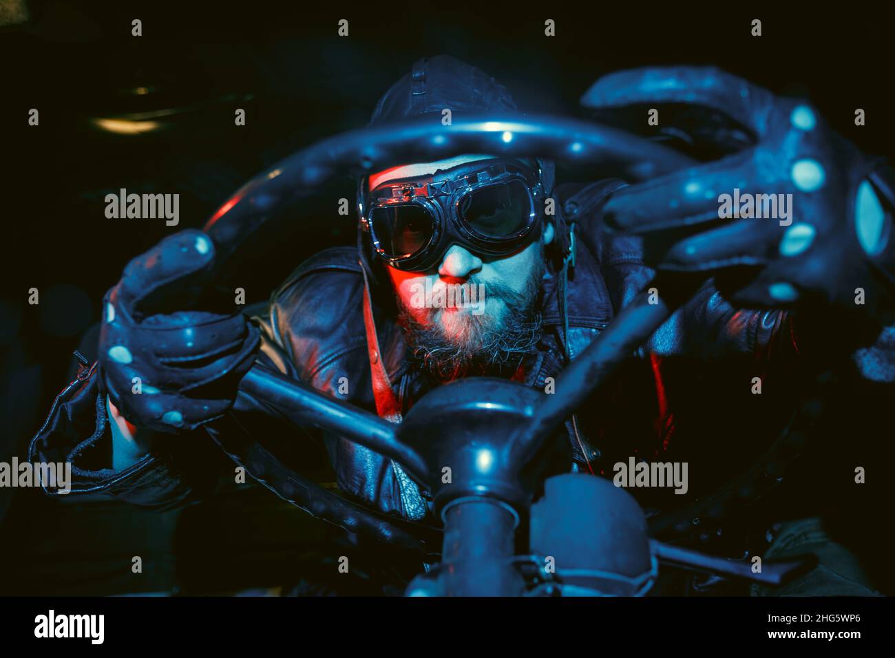 Old school retro image of crazy driver with beard wearing vintage ...