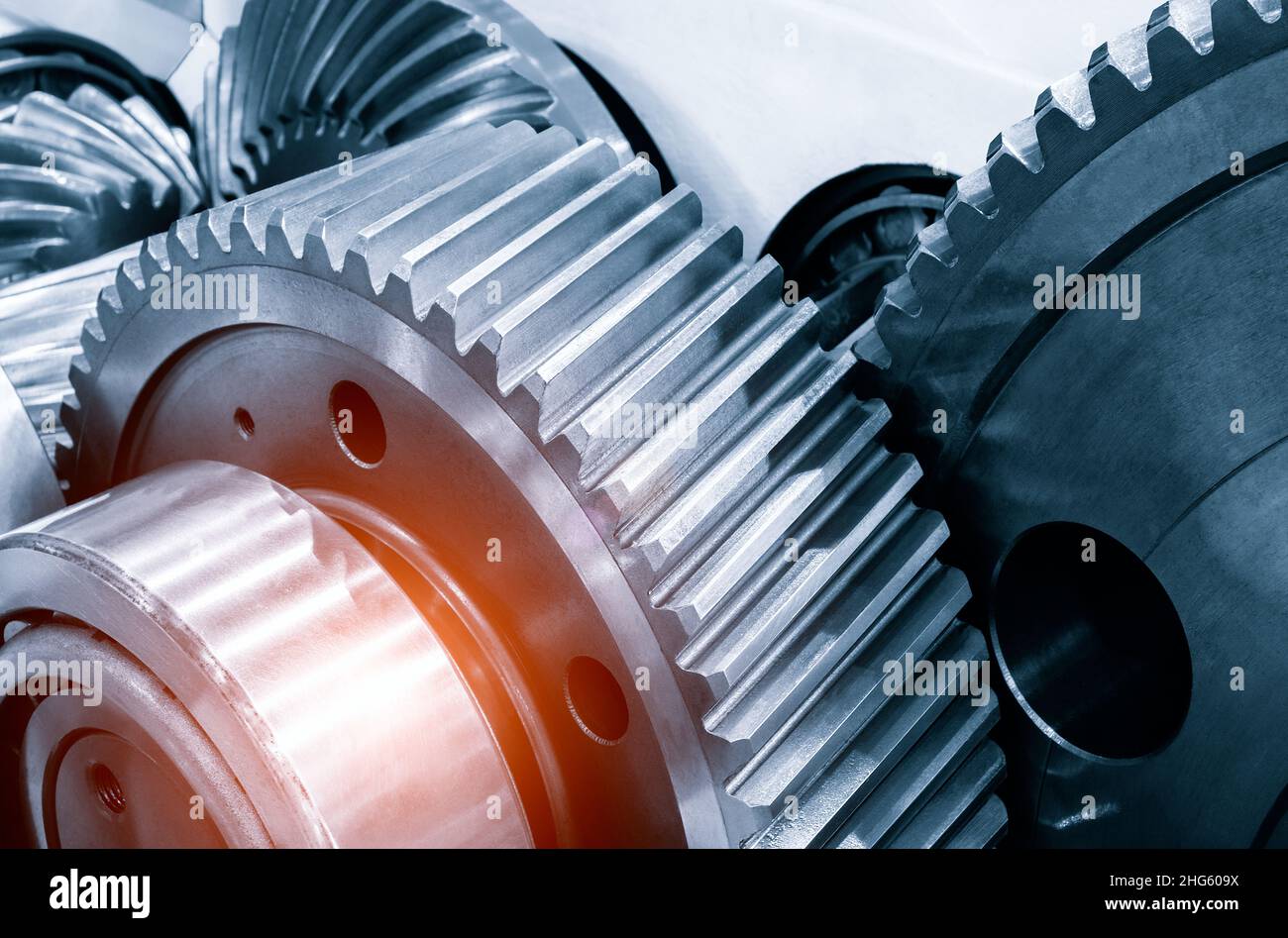 Gears of transmission gearbox, industrial background Stock Photo - Alamy