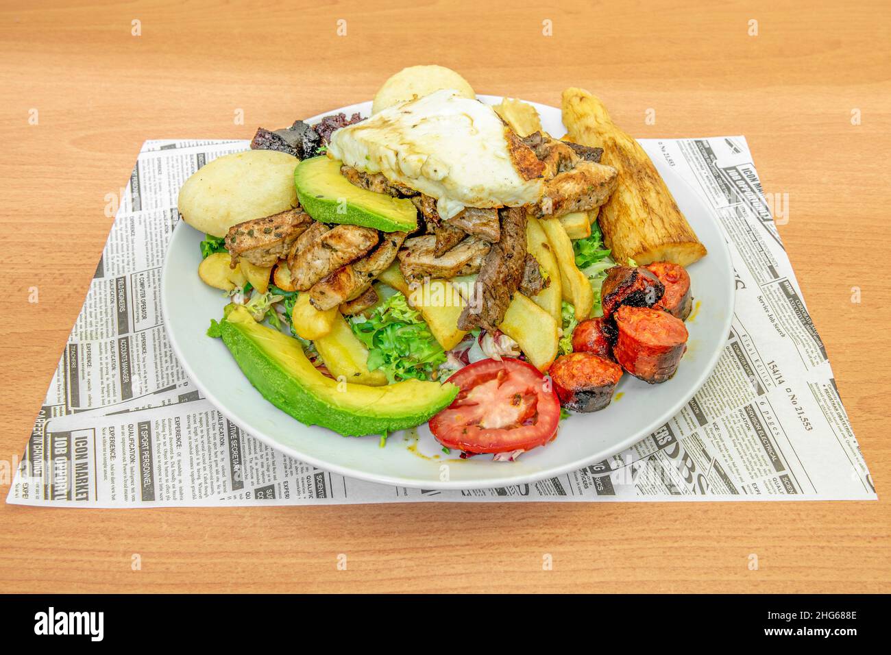 The Venezuelan grill is made up of beef, chorizo, chicken, black ...