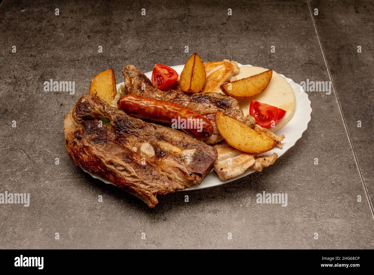An asado has cuts of meat, roast strips or ribs, vacuum, chorizo, and ...