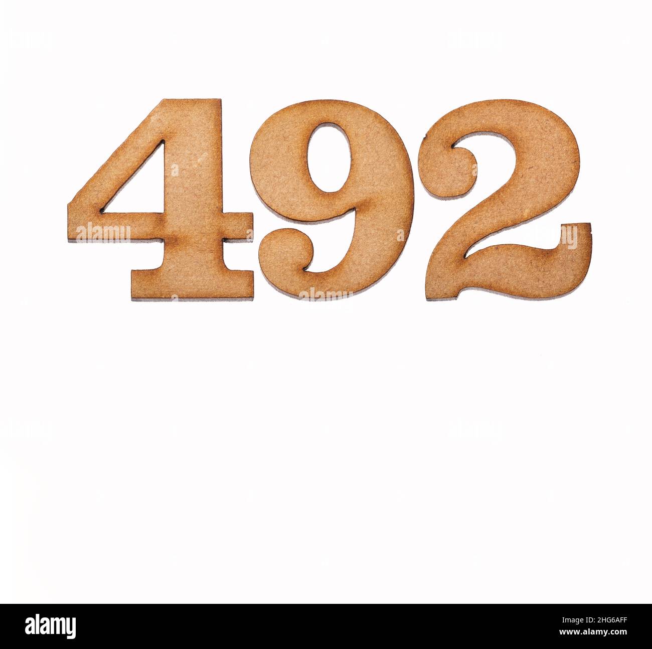 Number 492 in wood, isolated on white background Stock Photo - Alamy