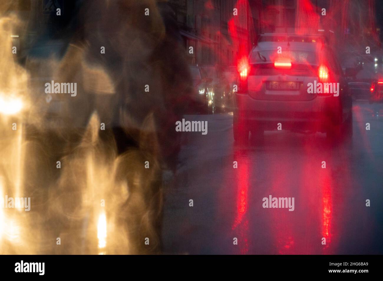 Messy traffic situations shot through rainy window Stock Photo - Alamy
