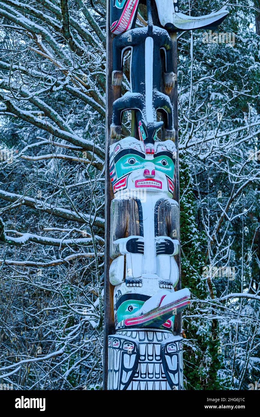 West Coast First Nations totem pole with snow, Brockton Point, Stanley ...