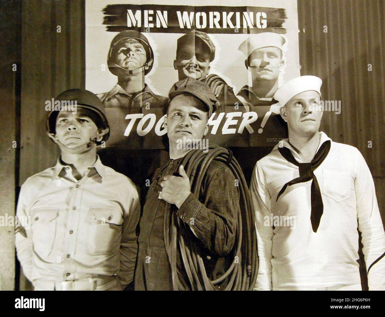 SGT Vineyard, George Woolslayer, and ACRM Evans with WWII poster, 1942 ...