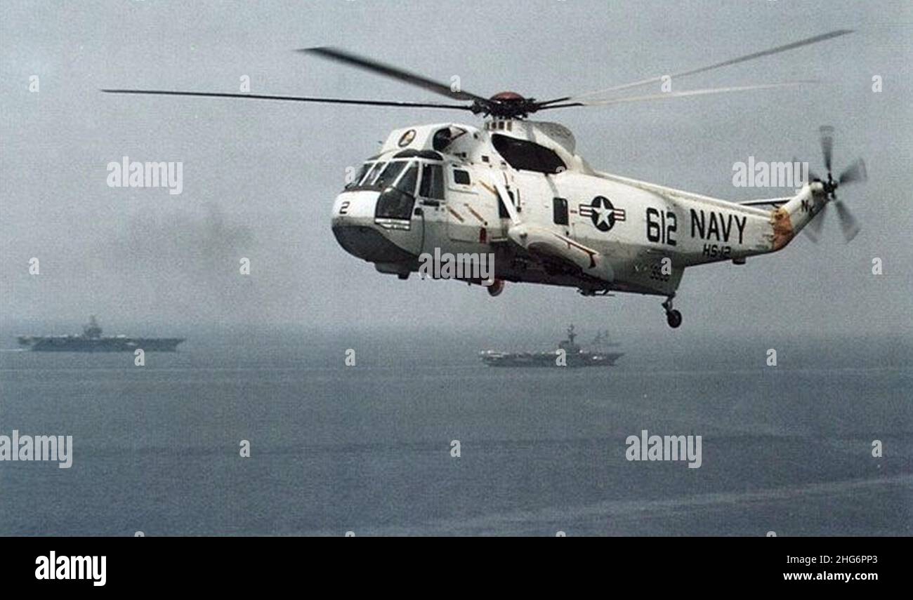 SH-3H Sea King of HS-12 in flight 1983 Stock Photo - Alamy
