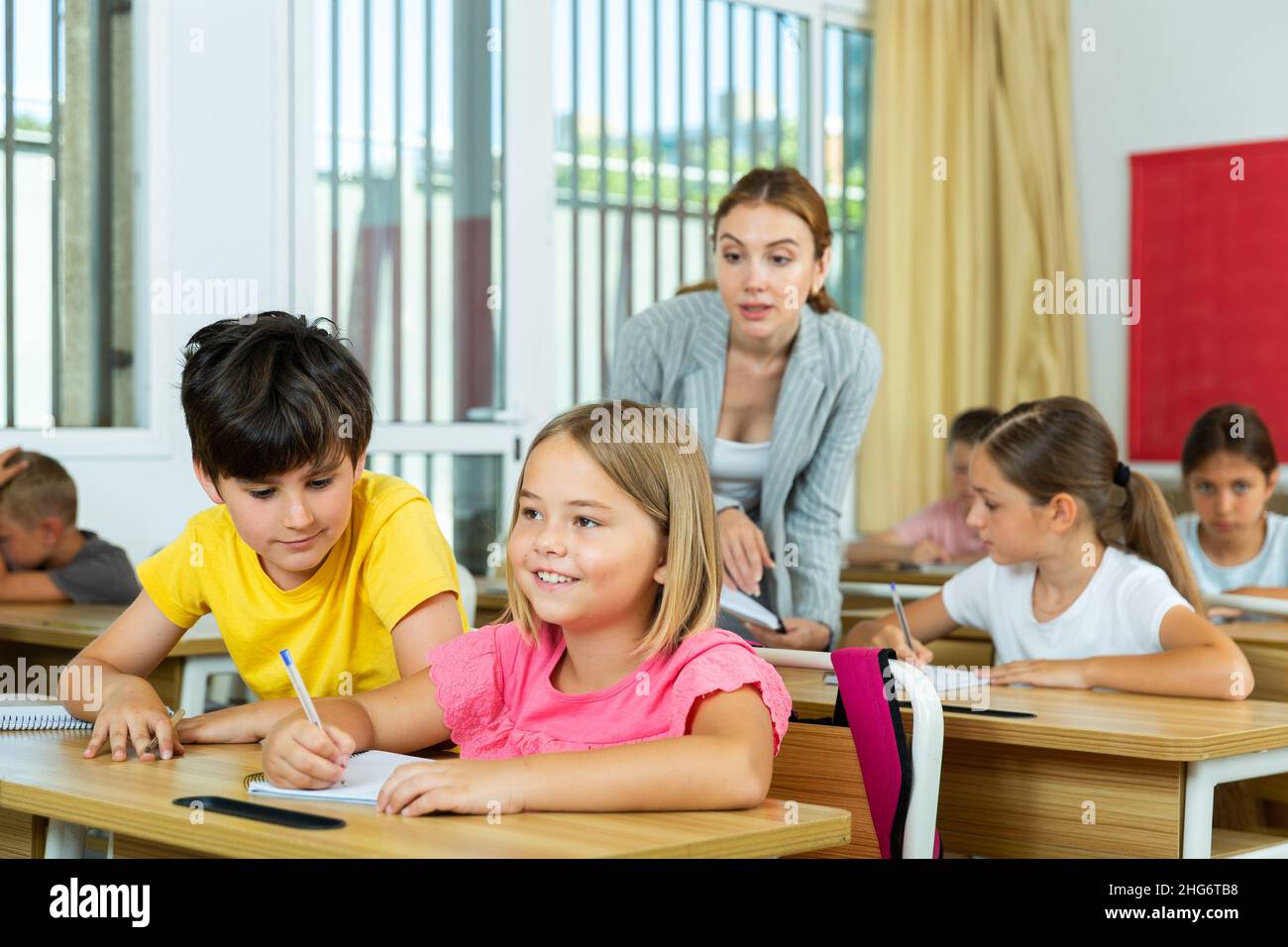 Children study in school kids lesson with teacher hi-res stock ...