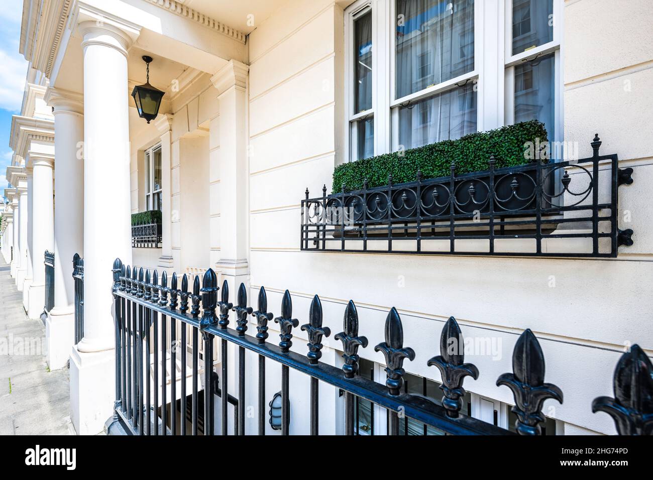 Pimlico, London terraced row house building white columns exterior old ...