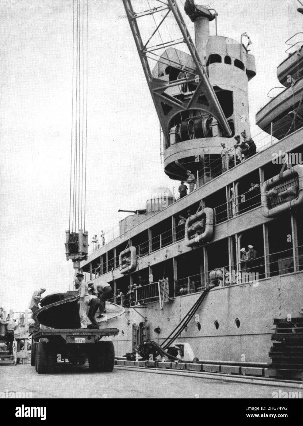 Ship propeller is loaded aboard USS Dixie (AD-14) in 1950 Stock Photo ...