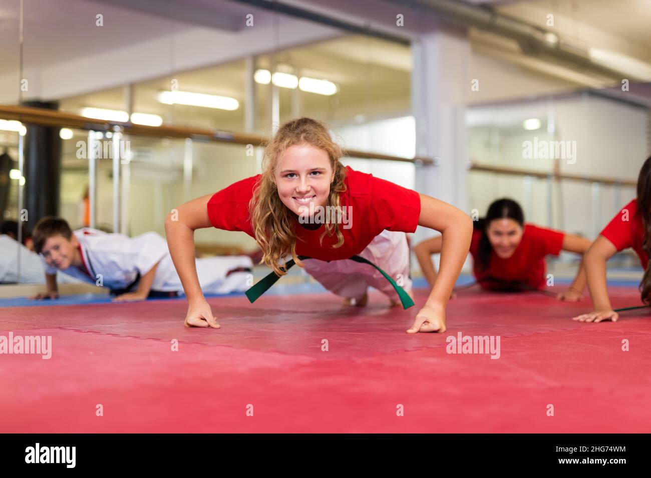 Kids doing push-ups during karate training Stock Photo - Alamy