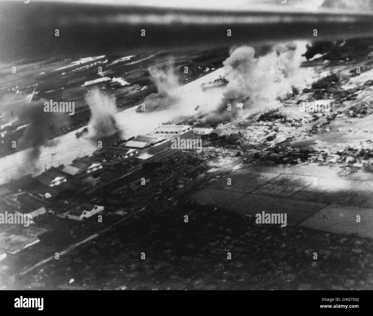 Ships and oil storage facilities afire on the Saigon waterfront ...