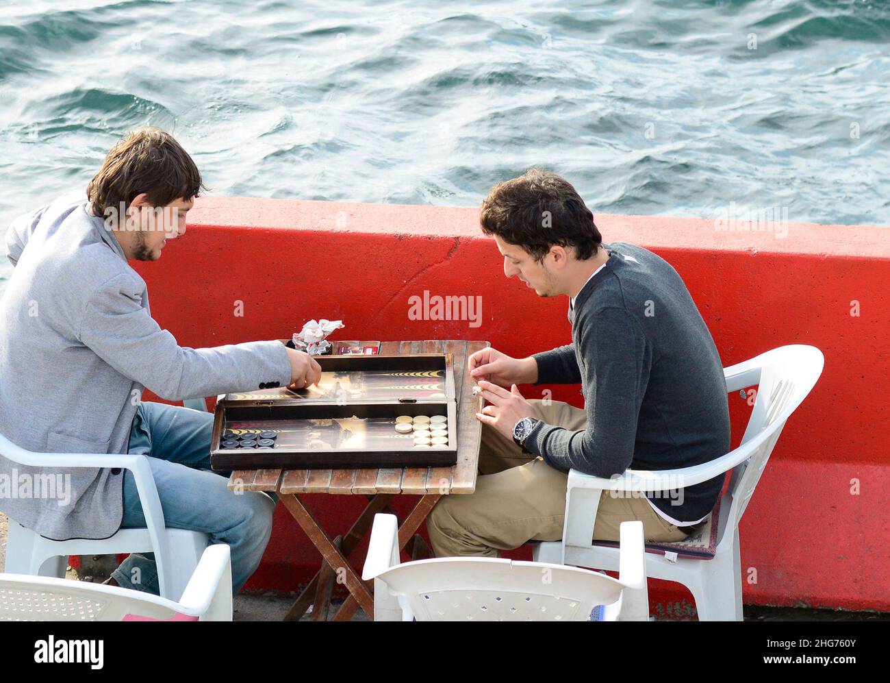 Turkish men playing backgammon on the Uskudar Coast Walkway seaside ...