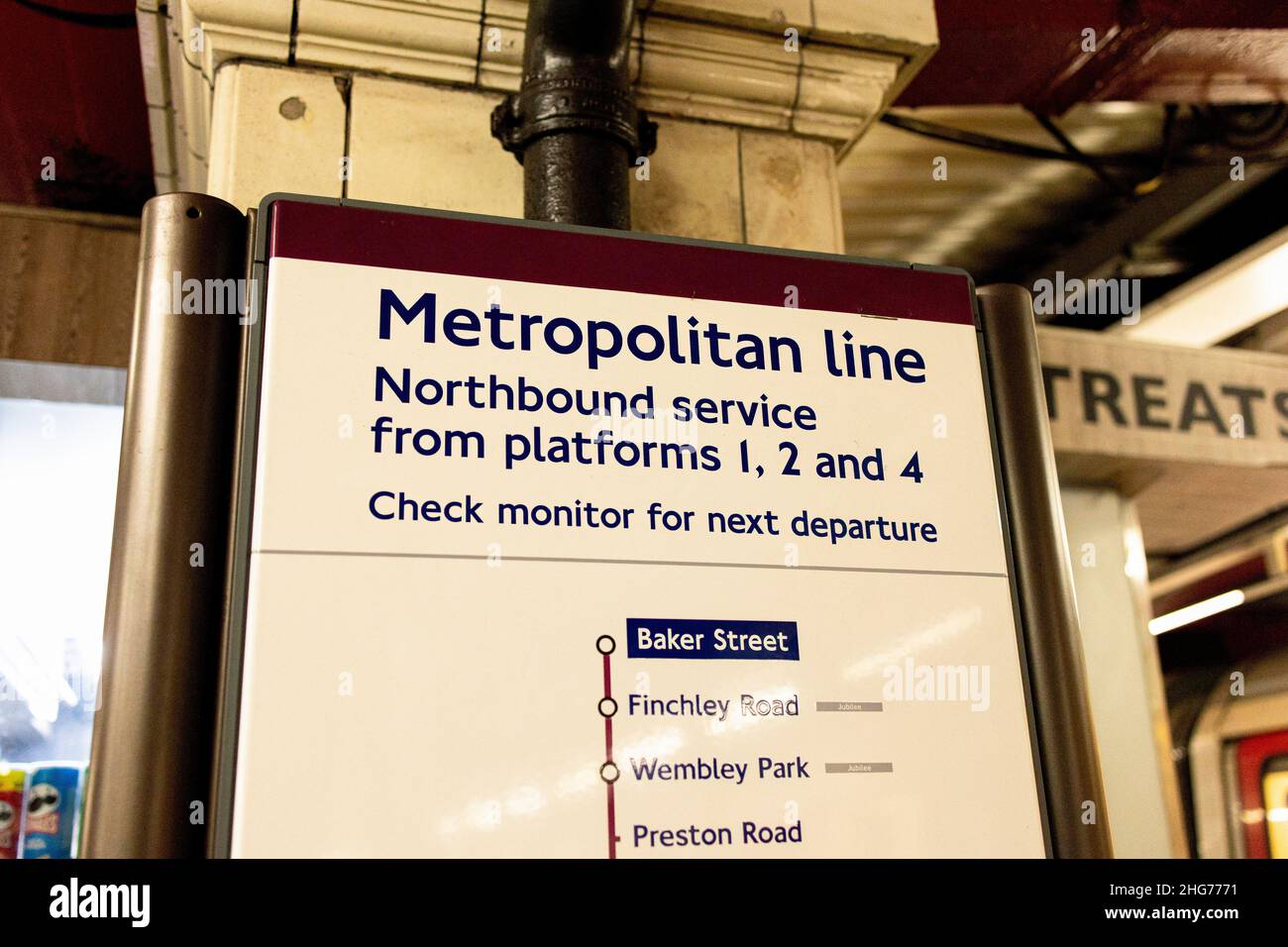 A sign showing the route and platforms of Metropolitan line at a London ...