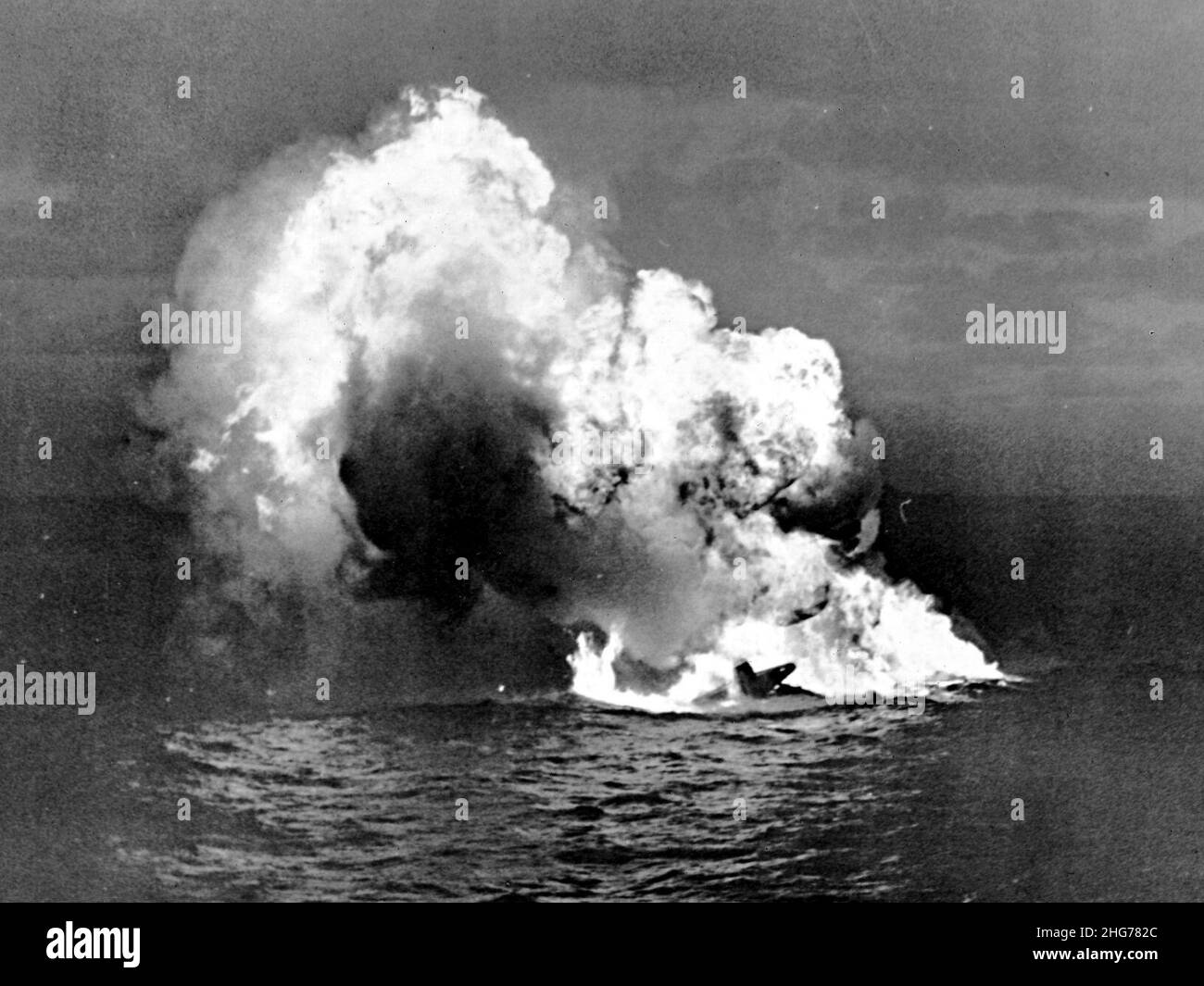 Shot down Mitsubishi G4M burning on the water c1944 Stock Photo - Alamy