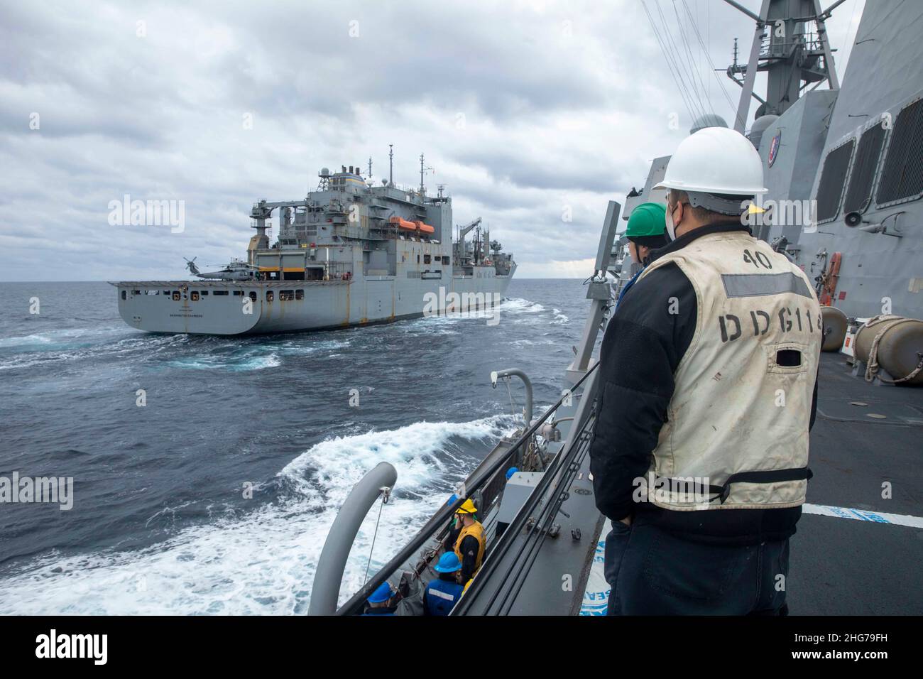 PHILIPPINE SEA (Jan. 15, 2022) Sailors aboard the Arleigh Burke-class ...