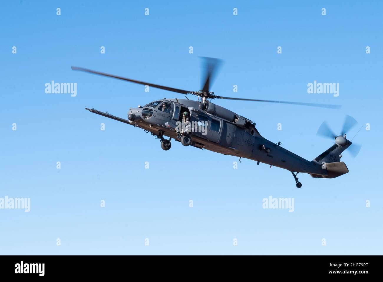 Members of the 512th Rescue Squadron train in an HH-60G Pave Hawk near ...