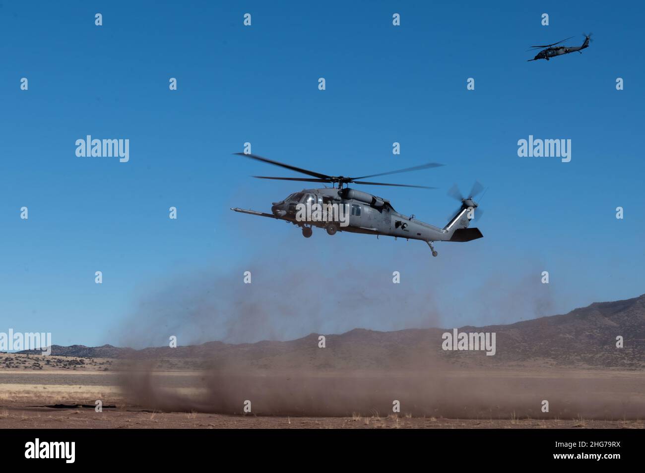 Members of the 512th Rescue Squadron practice landing techniques in an ...