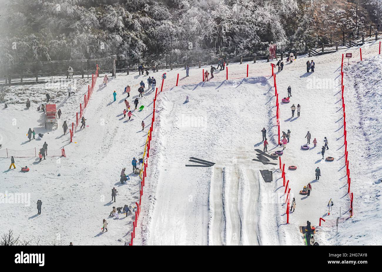 CHONGQING, CHINA - JANUARY 17, 2022 - People enjoy snow and ice sports ...