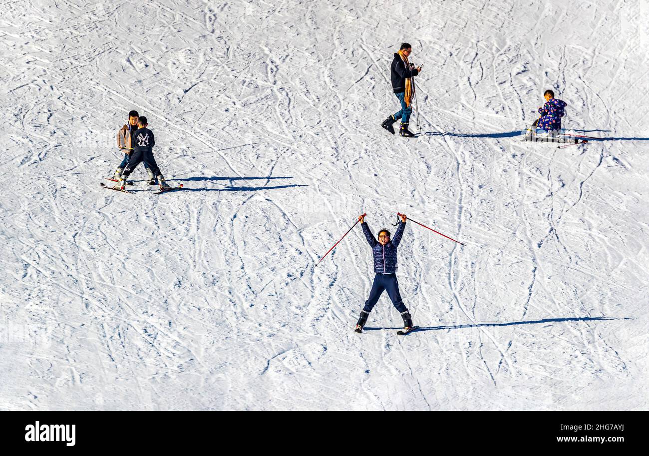 CHONGQING, CHINA - JANUARY 17, 2022 - People enjoy snow and ice sports ...