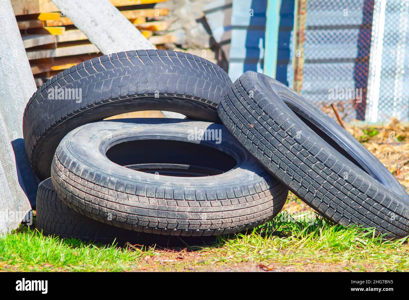 view of old worn out wheels, rubber tires from a car with a worn tread ...